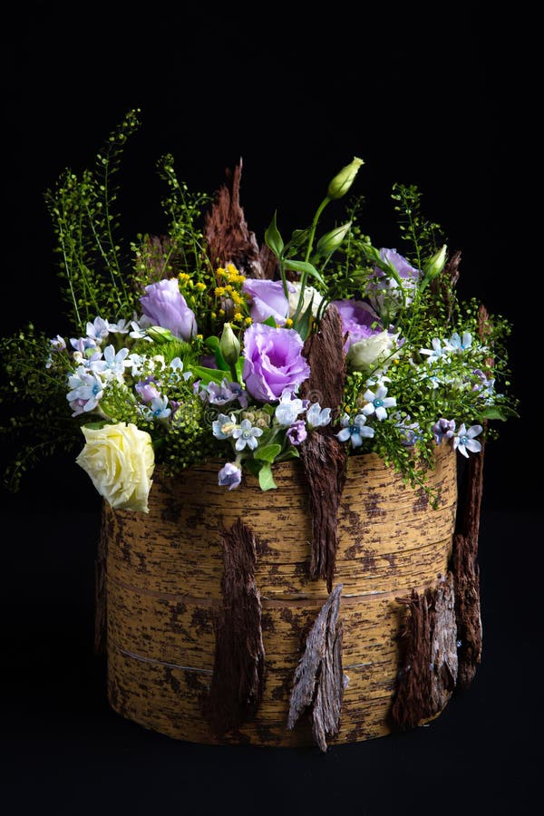 Composition of Natural Flowers in a Decorative Vase Made of Tree Bark ...