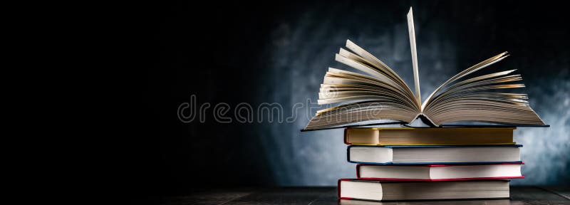 A Composition with an Open Book Lying on a Stack of Other Books Stock ...