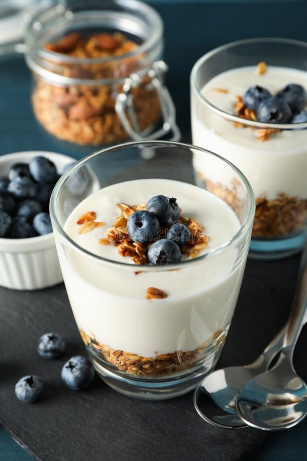 Composition with Parfaits Desserts on Dark Blue Background Stock Image ...
