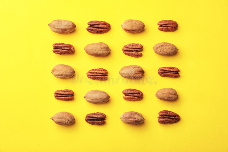 Composition with Pecan Nuts on Color Background Stock Photo - Image of ...