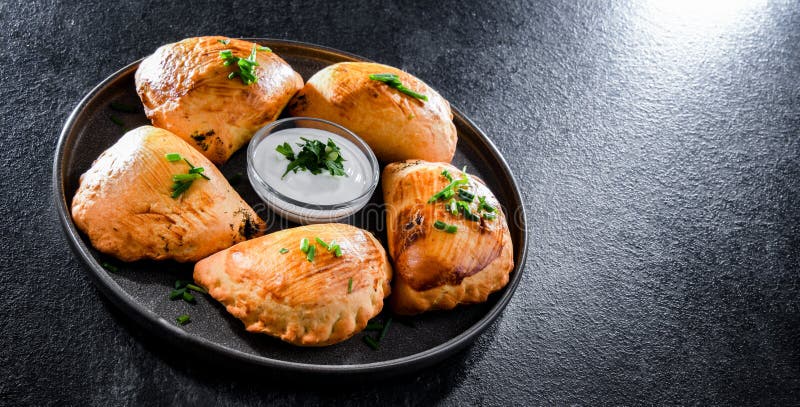 Composition with a Plate of Oven-baked Pierogi Stock Photo - Image of ...