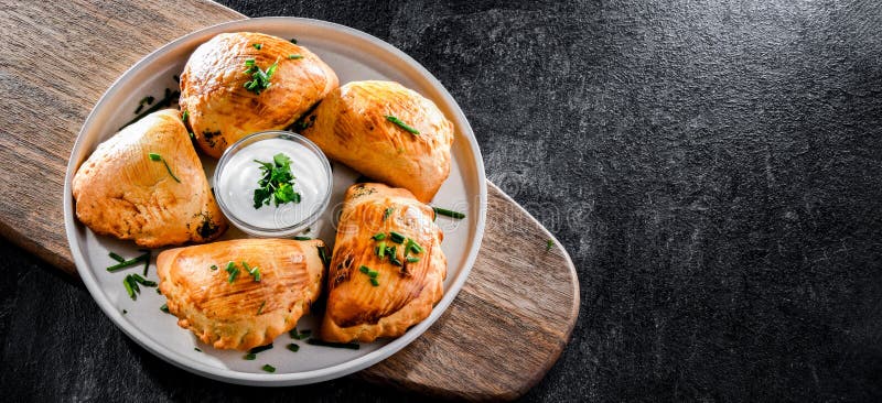 Composition with a Plate of Oven-baked Pierogi Stock Image - Image of ...