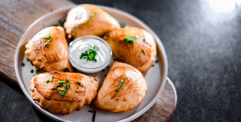 Composition with a Plate of Oven-baked Pierogi Stock Image - Image of ...