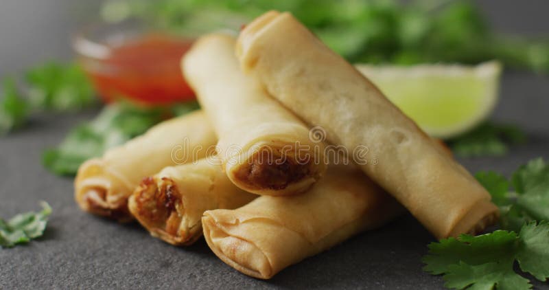 Composition of Plate with Spring Rolls and Chilli Sauce on Grey ...