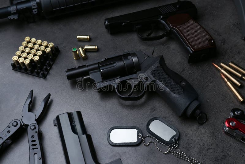 Composition with Professional Guns on Black Background, Above View ...
