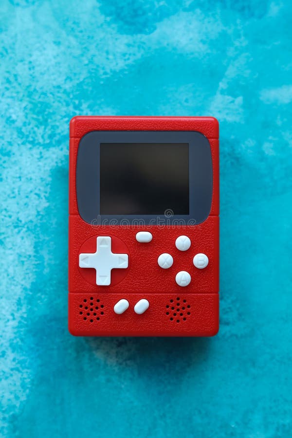 Retro Video Game Console on a Blue Background, Top View. Stock Photo ...