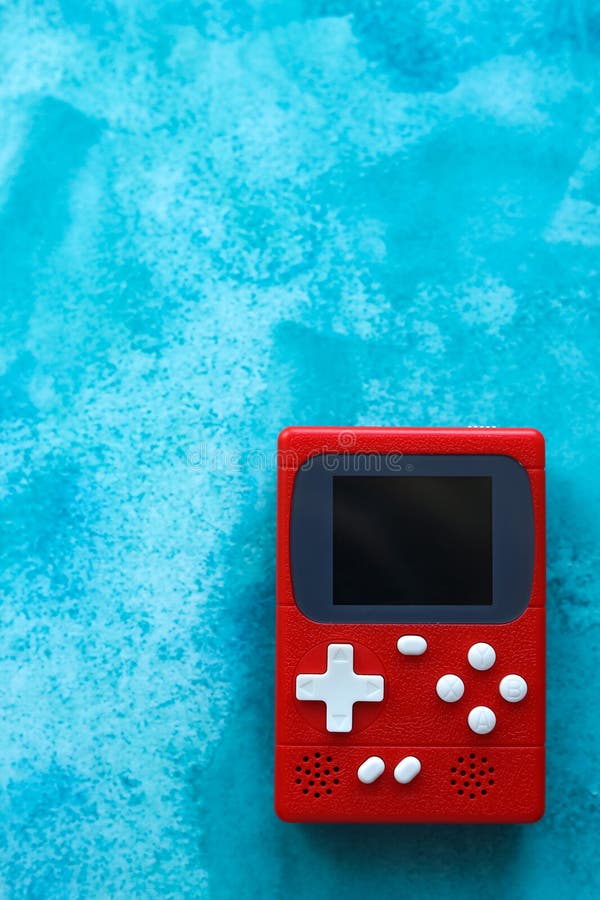 Retro Video Game Console on a Blue Background, Top View. Stock Image ...
