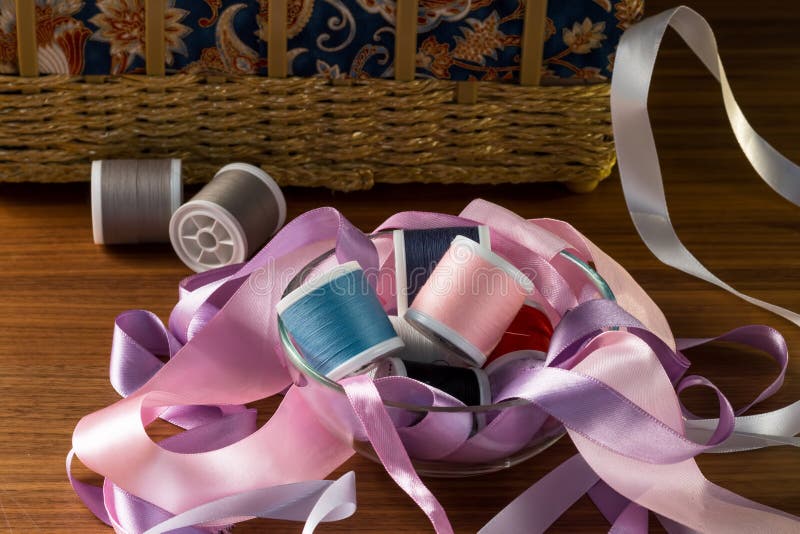 Composition of Ribbons and Thread on a Wooden Table. Stock Photo ...