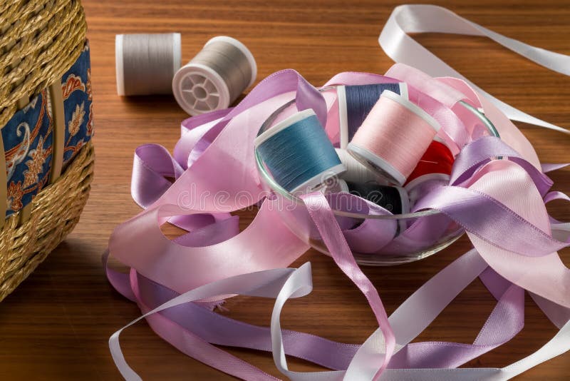 Composition of Ribbons and Thread on a Wooden Table. Stock Photo ...