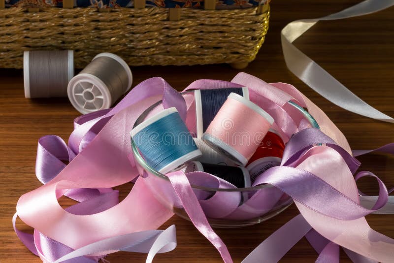Composition of Ribbons and Thread on a Wooden Table. Stock Photo ...