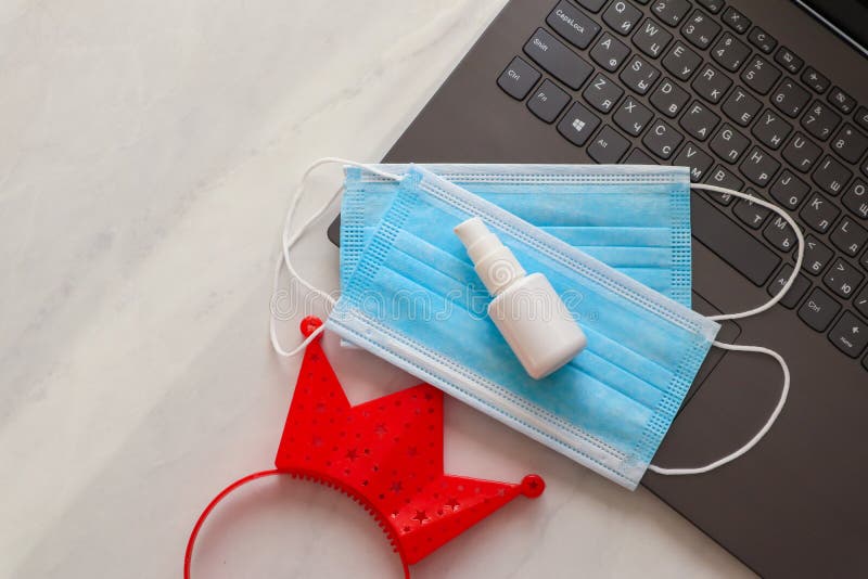 Composition with Safety Face Mask and Laptop on Light Background Stock ...