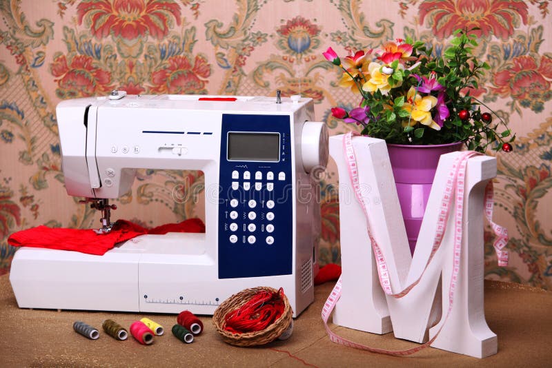 Composition from a Sewing Machine. Mannequin, Flowers on a Retro Table ...