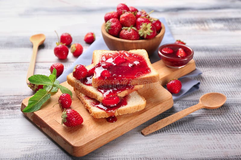 Composition with Slices of Bread and Delicious Strawberry Jam on Wooden ...
