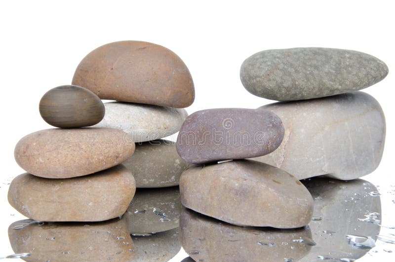 Composition of Stacked Pebbles with a White Flower Stock Photo - Image ...