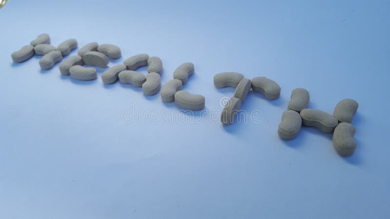 The Composition of Tablets that Form Alphabet Letters that Read Herbal ...