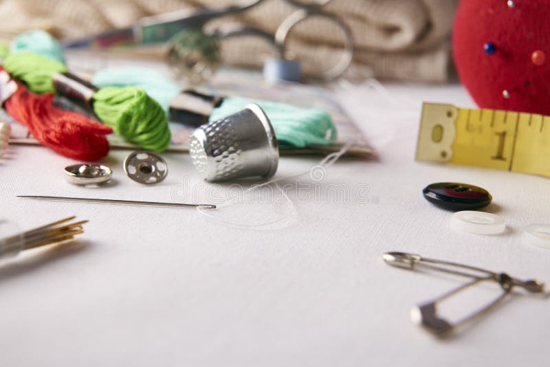 Composition Tools for Embroidery on White Fabric Stock Photo - Image of ...