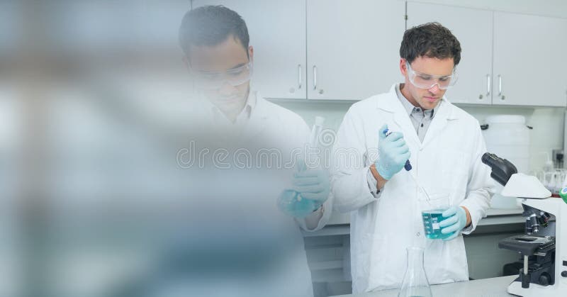 Composition of Two Male Scientists in Lab Using Pipette and Test Tubes ...