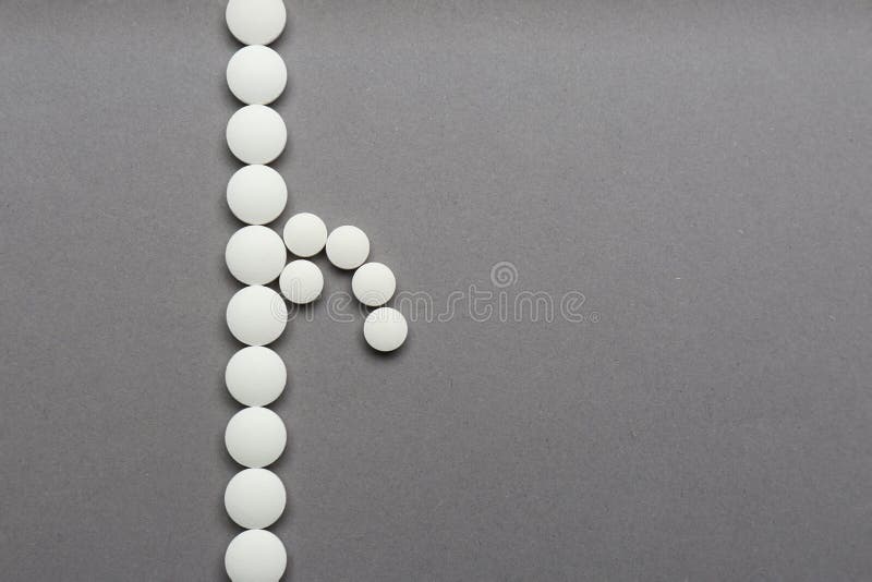 Composition of White Pills Symbolizing Potency Problems on Grey ...