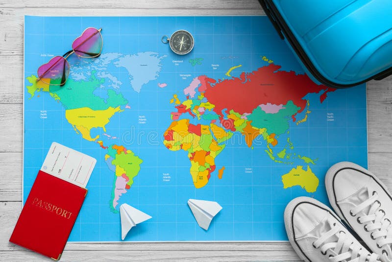 Composition with World Map and Travel Items on Wooden Background Stock ...