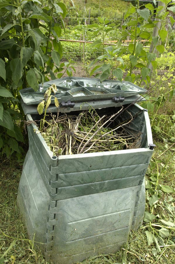 Compost barrel in a garden stock photo. Image of gardening - 217085428
