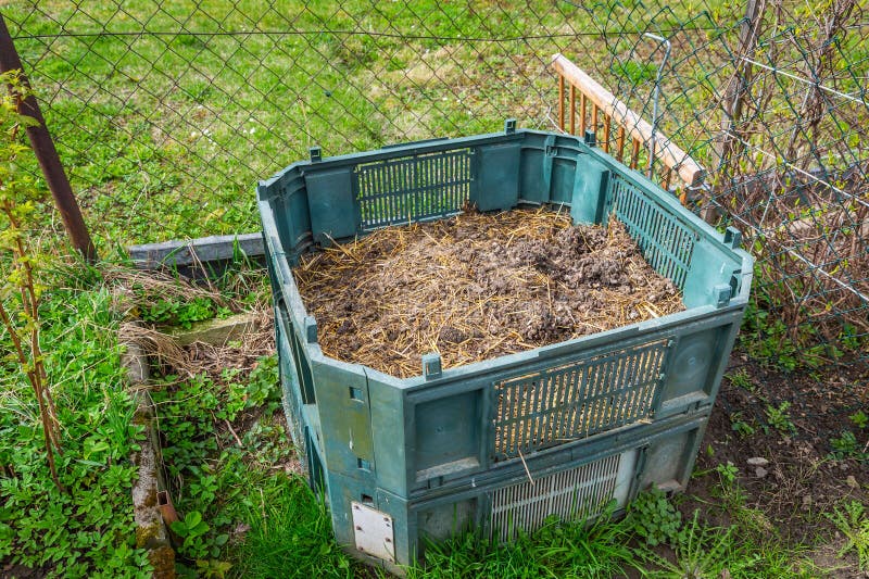 Compost Bin in a Garden, Using Kitchen and Green Waste To Prepare ...