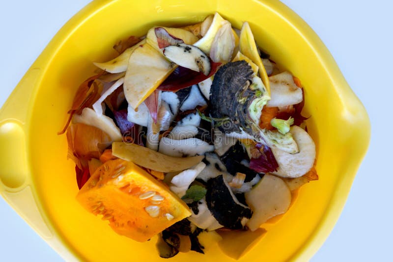 Compost in a yellow bowl stock image. Image of ecological - 163602167