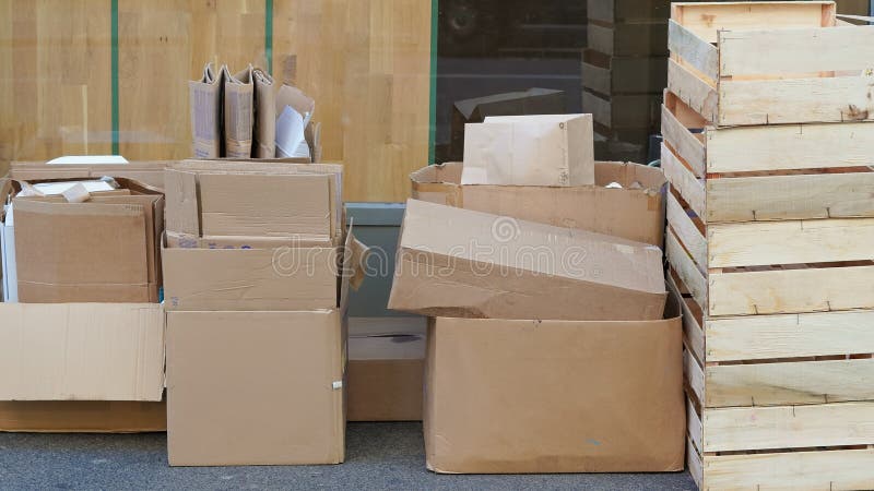 Compressed Cardboard Stacked Outdoors, Ready for Eco Waste Processing ...
