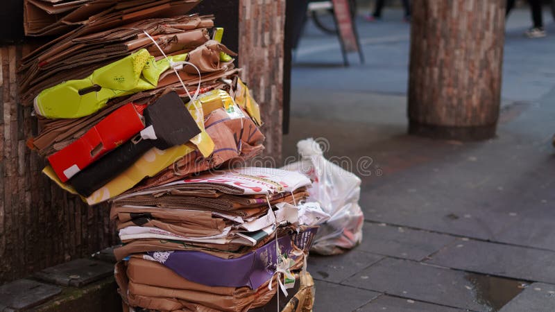 Compressed Cardboard Stacked Outdoors, Ready for Eco Waste Processing ...