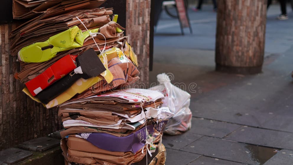 Compressed Cardboard Stacked Outdoors, Ready for Eco Waste Processing ...