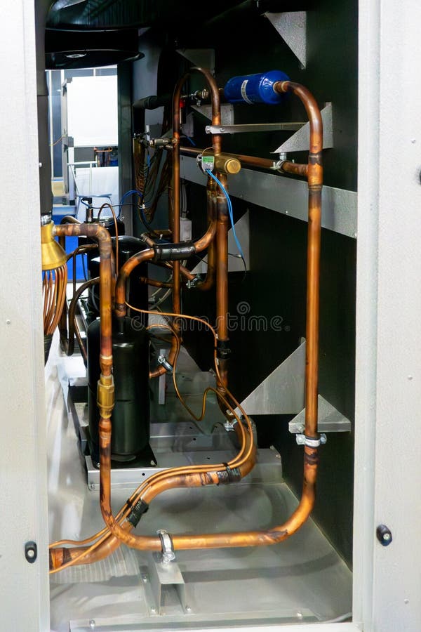 The Compressor of the Refrigerator with Copper Pipes Stock Photo ...