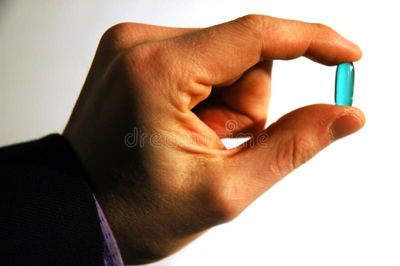 Comprimido azul imagem de stock. Imagem de oferta, dedos - 152149