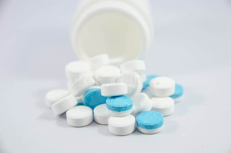 Comprimido Branco E Azul No Blackground Branco Imagem de Stock - Imagem ...