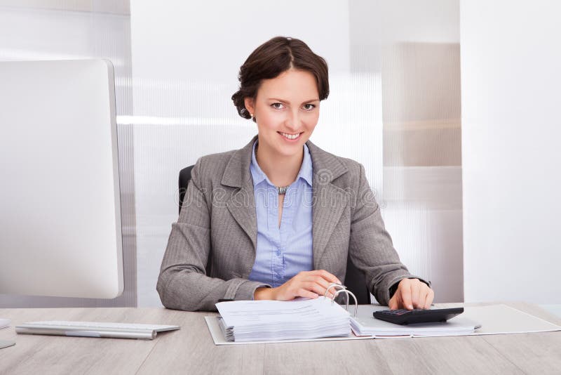 The Company`s Female Accountant is Checking the Company`s Financial ...