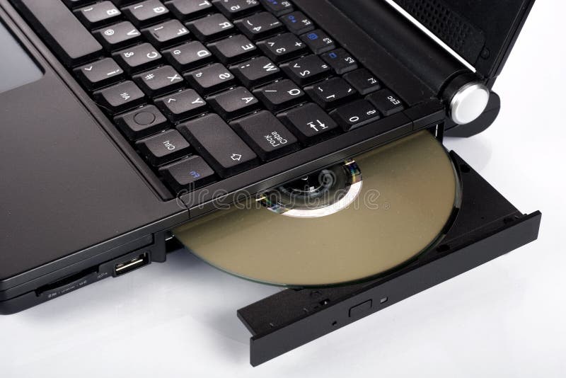 Computadora Portátil Con El CD-ROM Imagen de archivo - Imagen de dinero ...