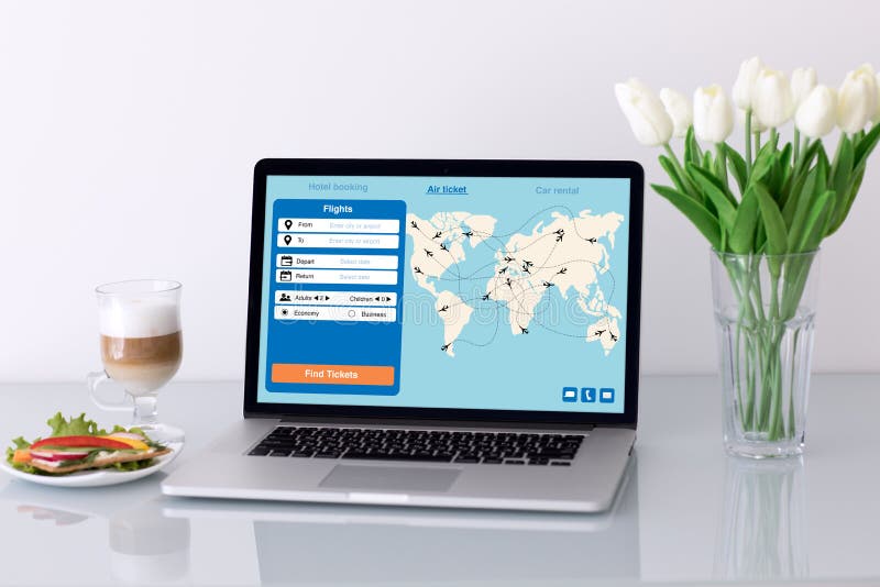 Computer with Application Search Air Ticket Screen on Table Cafe Stock ...