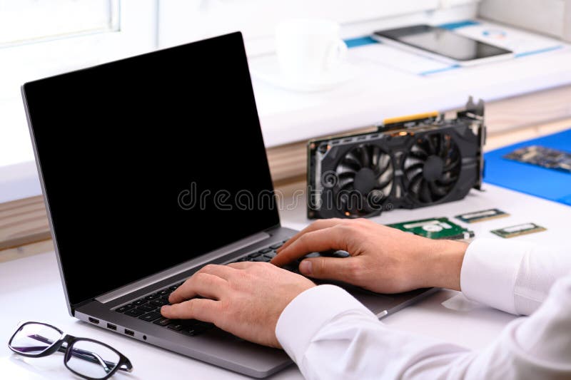 . Computer Assembly Courses. There is a Computer and Parts on the Table ...