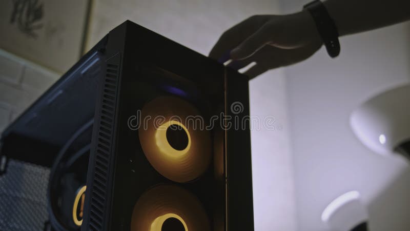 Computer with Backlight. Clip. Man Turns on Computer with Backlight ...