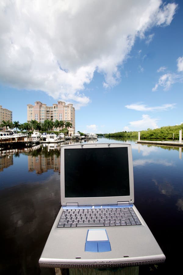 Computer on the bay. stock image. Image of clouds, marina - 6448121