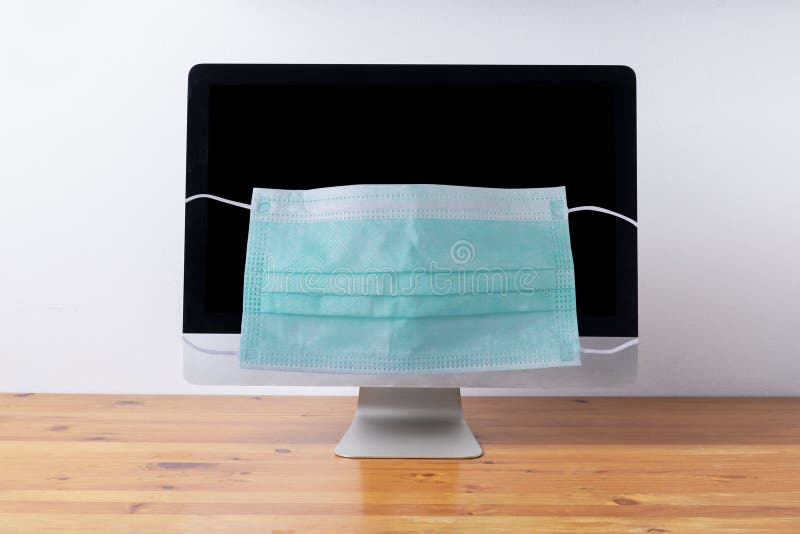 Computer Black Screen on Table Wood with Protective Face Mask Stock ...