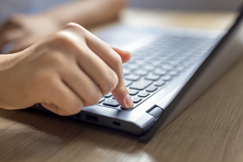 Computer Button on and Off. Confirmation by Button on the Keyboard on a ...