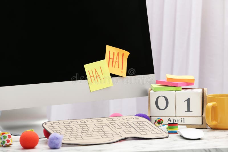 Computer with Cardboard Keyboard on White Marble Table. April Fool`s ...