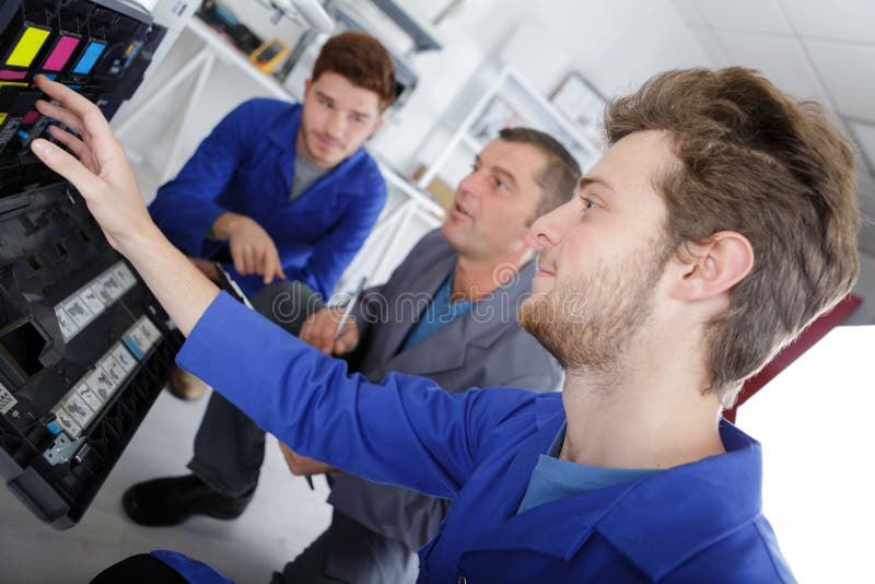 Computer Cartridges Inspected by Apprentice Stock Photo - Image of ...