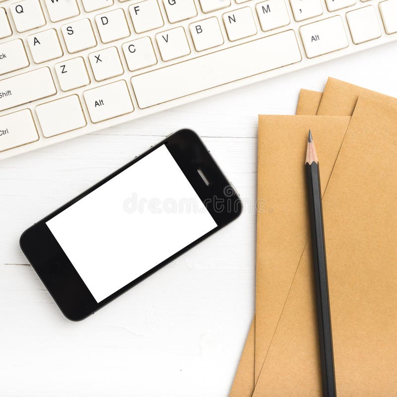 Computer and Cellphone with Brown Paper and Pencil Stock Photo - Image ...