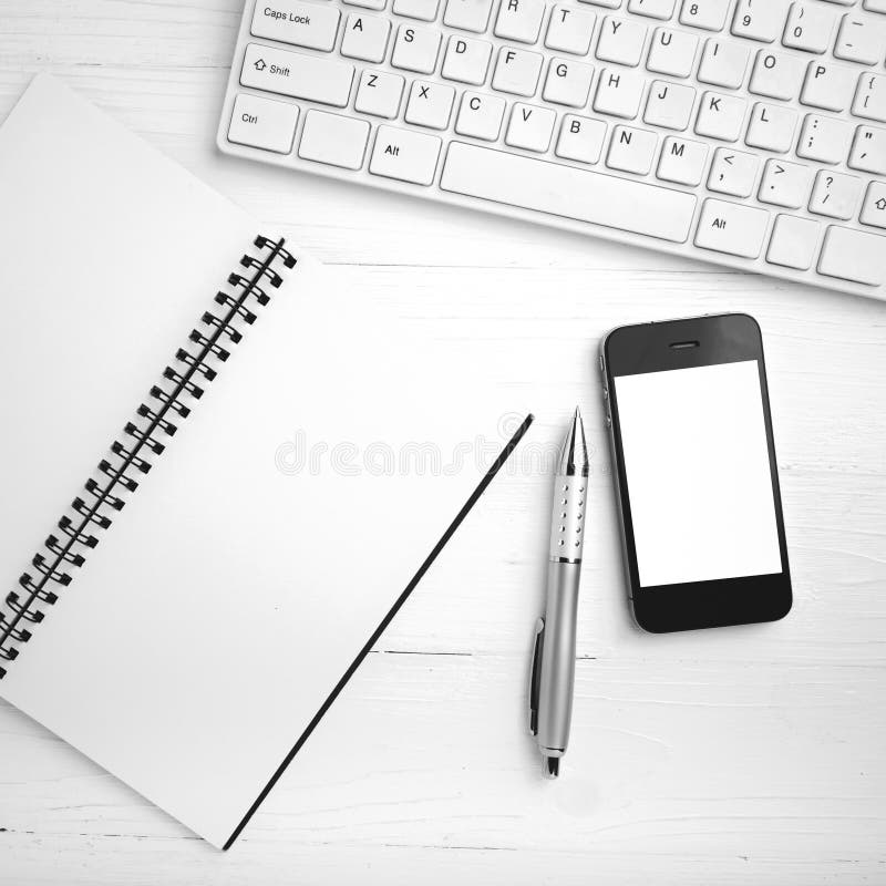 Computer and Cellphone with Notebook and Pen Black and White Col Stock ...