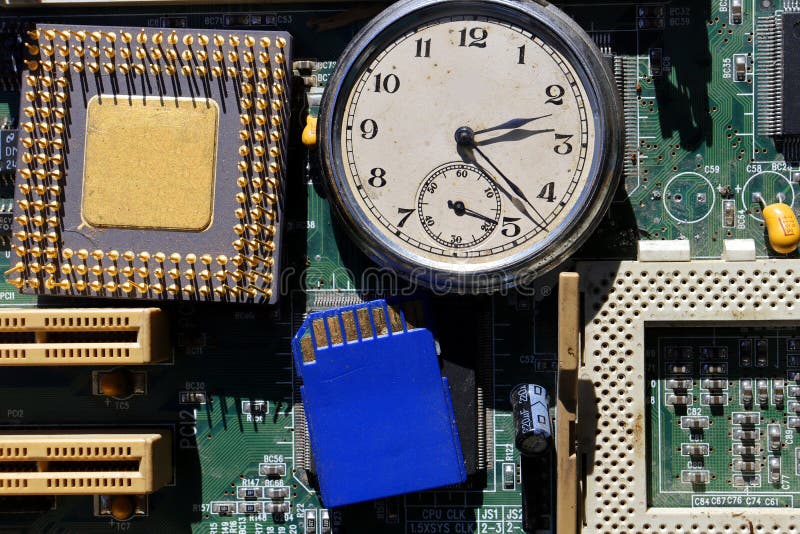 Computer Chip on Circuit Board and Pocket Watch Stock Photo - Image of ...