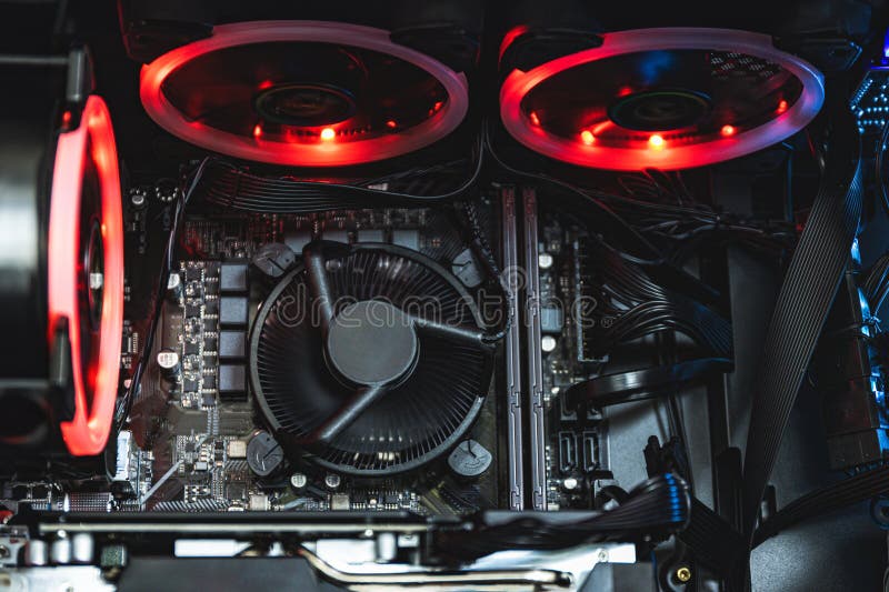 Computer Circuit Board and CPU Cooling Fans Illuminated by Internal LED ...