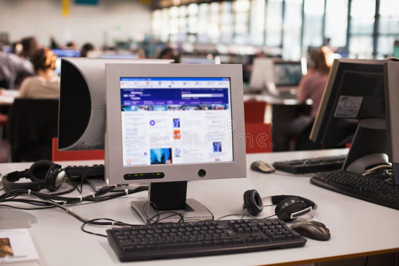 Group of University Students Working on Computers in Campus Classroom ...