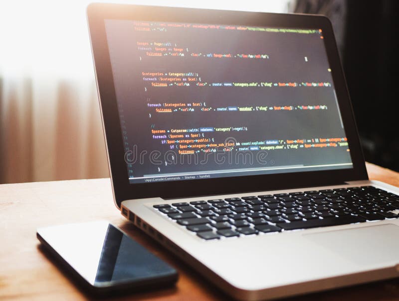Computer Code on Laptop Web Developing and Cellphone Stock Image ...