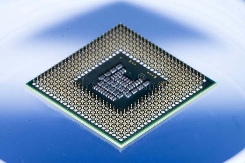 Computer CPU on a Blue Light Background Stock Image - Image of macro ...