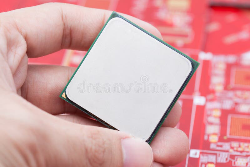 Computer CPU on hand stock photo. Image of circuit, industry - 35664964